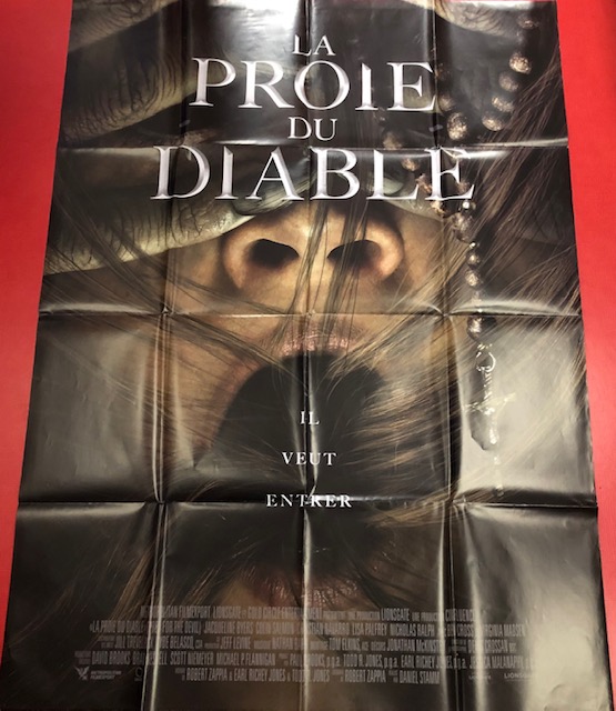 Affiche de cinéma du film "La Proie du Diable"